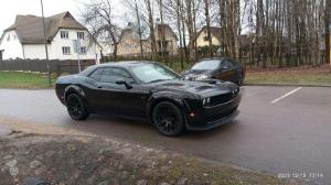 Orange Dodge Challenger 2023 in Klaipeda, with an engine capacity of 6.40 L and mileage of 21 thousand km for 34999 €, photo 4 on AUTOMOTO.COM.LV