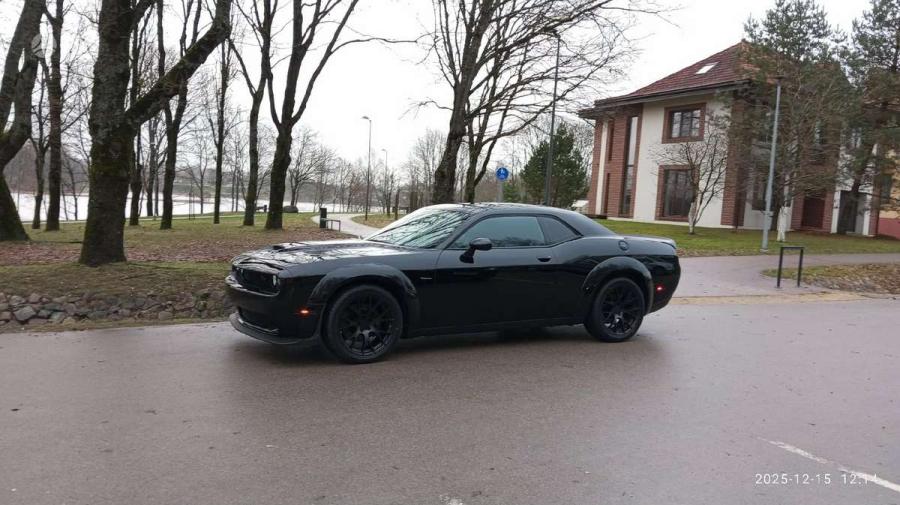 Orange Dodge Challenger 2023 in Klaipeda, with an engine capacity of 6.40 L and mileage of 21 thousand km for 34999 €, photo 11 on AUTOMOTO.COM.LV