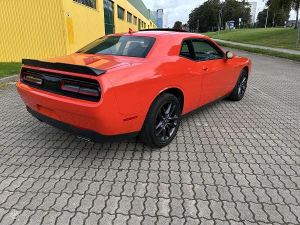 Oranžs Dodge Challenger 2023 Klaipėda, ar dzinēja tilpumu 3.60 L un nobraukumu 62 tūkst. km par 22222 €, foto 6 vietnē AUTOMOTO.COM.LV