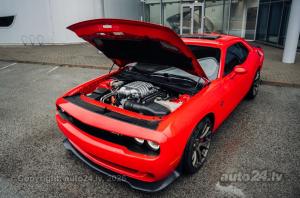 Sarkans Dodge Challenger 2016 Tallina, ar dzinēja tilpumu 6.20 L un nobraukumu 33 tūkst. km par 55900 €, foto 4 vietnē AUTOMOTO.COM.LV