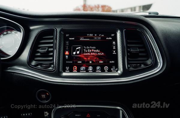 Red Dodge Challenger 2016 in Tallinn, with an engine capacity of 6.20 L and mileage of 33 thousand km for 55900 €, photo 10 on AUTOMOTO.COM.LV