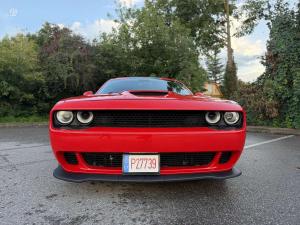 Red Dodge Challenger 2018 in Ukmerge, with an engine capacity of 3.60 L and mileage of 117 thousand km for 15500 €, photo 6 on AUTOMOTO.COM.LV