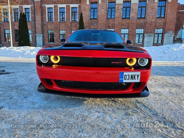 Red Dodge Challenger 2019 in Tallinn, with an engine capacity of 6.40 L and mileage of 56 thousand km for 31999 €, photo 8 on AUTOMOTO.COM.LV