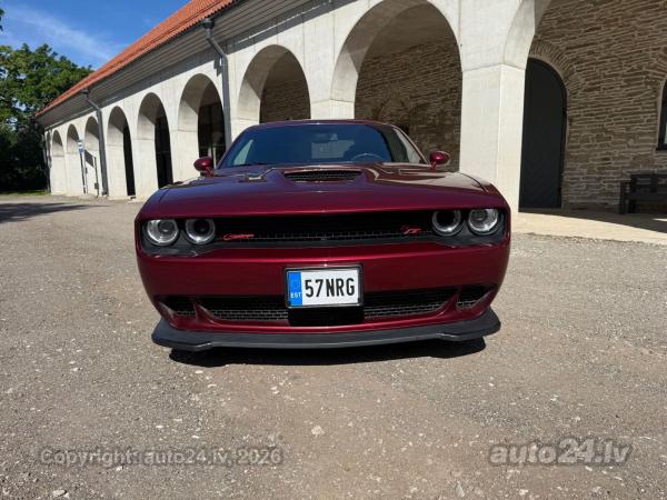 Sarkans Dodge Challenger 2021 Tallina, ar dzinēja tilpumu 5.70 L un nobraukumu 38 tūkst. km par 30900 €, foto 5 vietnē AUTOMOTO.COM.LV