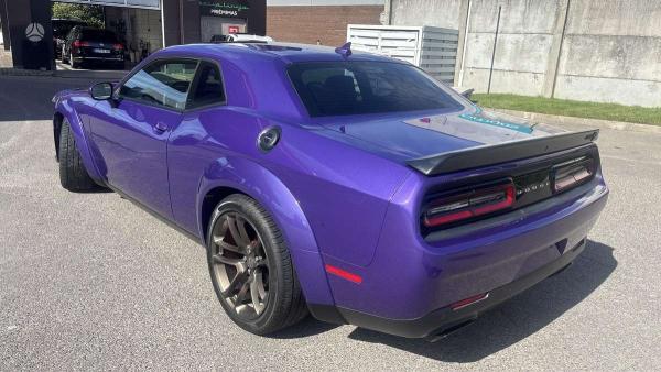 Violet Dodge Challenger 2023 in Panevezys, with an engine capacity of 6.20 L and mileage of 23 thousand km for 56900 €, photo 7 on AUTOMOTO.COM.LV