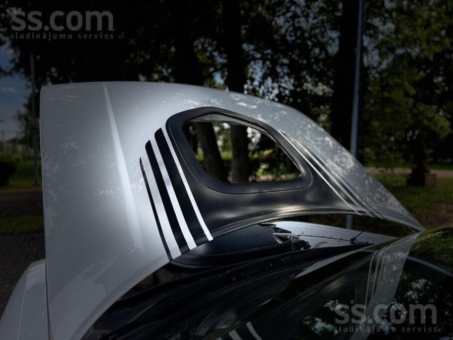 White Dodge Challenger 2015 in Jelgava, with an engine capacity of 5.70 L and mileage of 183 thousand km for 23900 €, photo 6 on AUTOMOTO.COM.LV