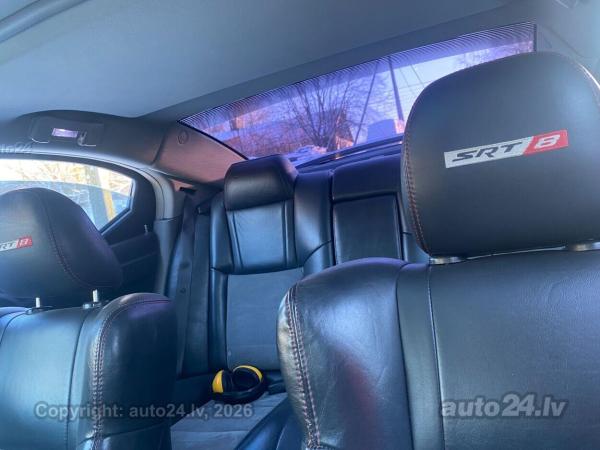 Melns Dodge Charger 2007 Tartu, ar dzinēja tilpumu 6.10 L un nobraukumu 143 tūkst. km par 18000 €, foto 11 vietnē AUTOMOTO.COM.LV