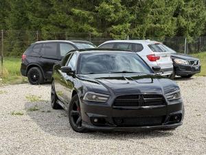 Melns Dodge Charger 2013 Kauņa, ar dzinēja tilpumu 5.65 L un nobraukumu 227 tūkst. km par 12999 €, foto  vietnē AUTOMOTO.COM.LV