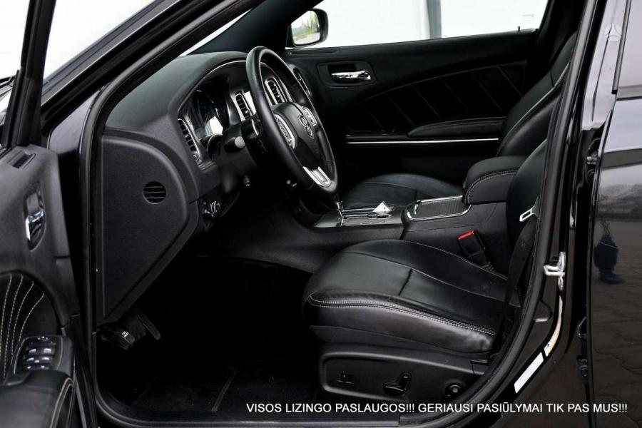 Black Dodge Charger 2015 in Kretinga, with an engine capacity of 5.70 L and mileage of 227 thousand km for 12499 €, photo 18 on AUTOMOTO.COM.LV