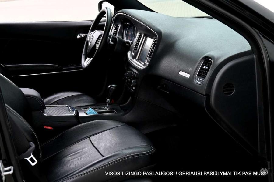 Black Dodge Charger 2015 in Kretinga, with an engine capacity of 5.70 L and mileage of 227 thousand km for 12499 €, photo 26 on AUTOMOTO.COM.LV