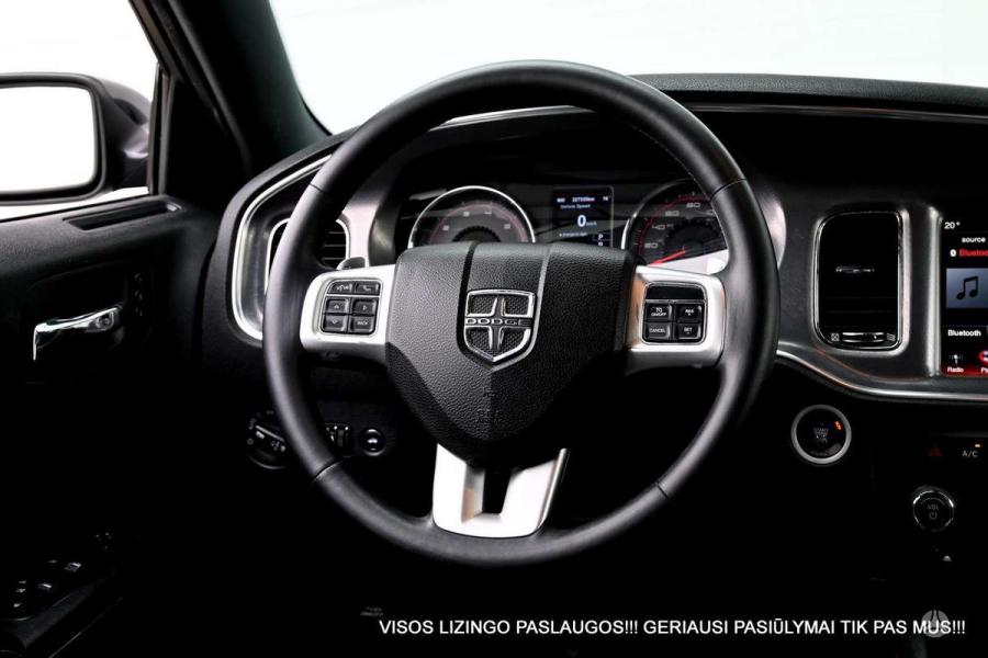 Black Dodge Charger 2015 in Kretinga, with an engine capacity of 5.70 L and mileage of 227 thousand km for 12499 €, photo 31 on AUTOMOTO.COM.LV