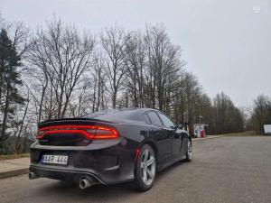 Black Dodge Charger 2016 in Alytus, with an engine capacity of 5.70 L and mileage of 270 thousand km for 19000 €, photo 8 on AUTOMOTO.COM.LV