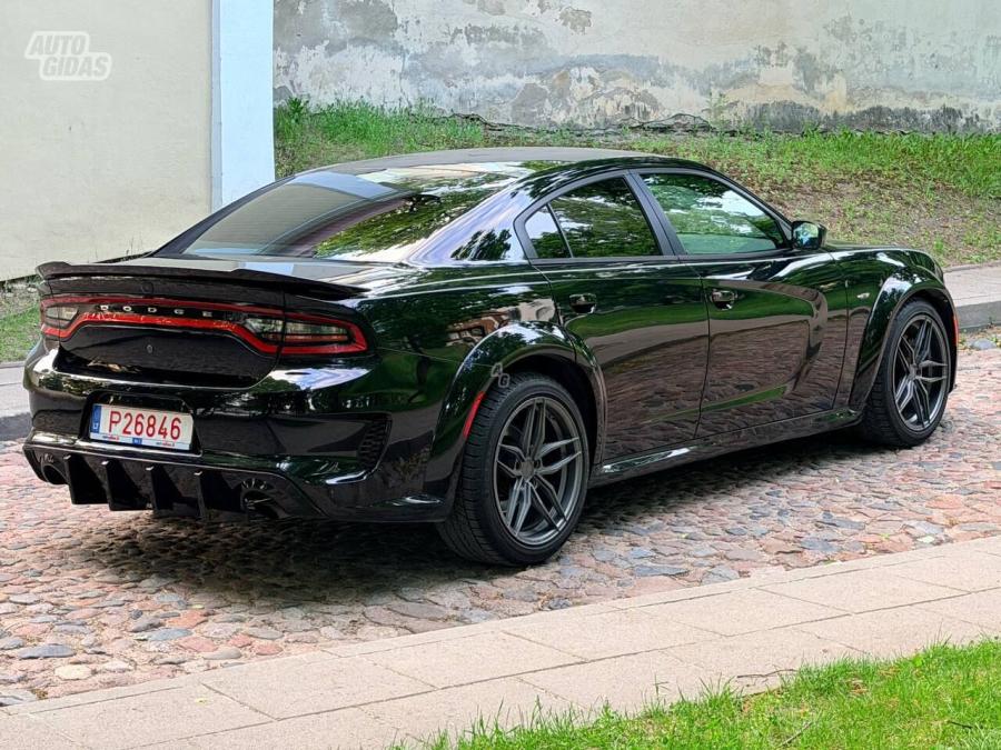 Black Dodge Charger 2016 in Vilnius, with an engine capacity of 5.70 L and mileage of 266 thousand km for 12500 €, photo 4 on AUTOMOTO.COM.LV