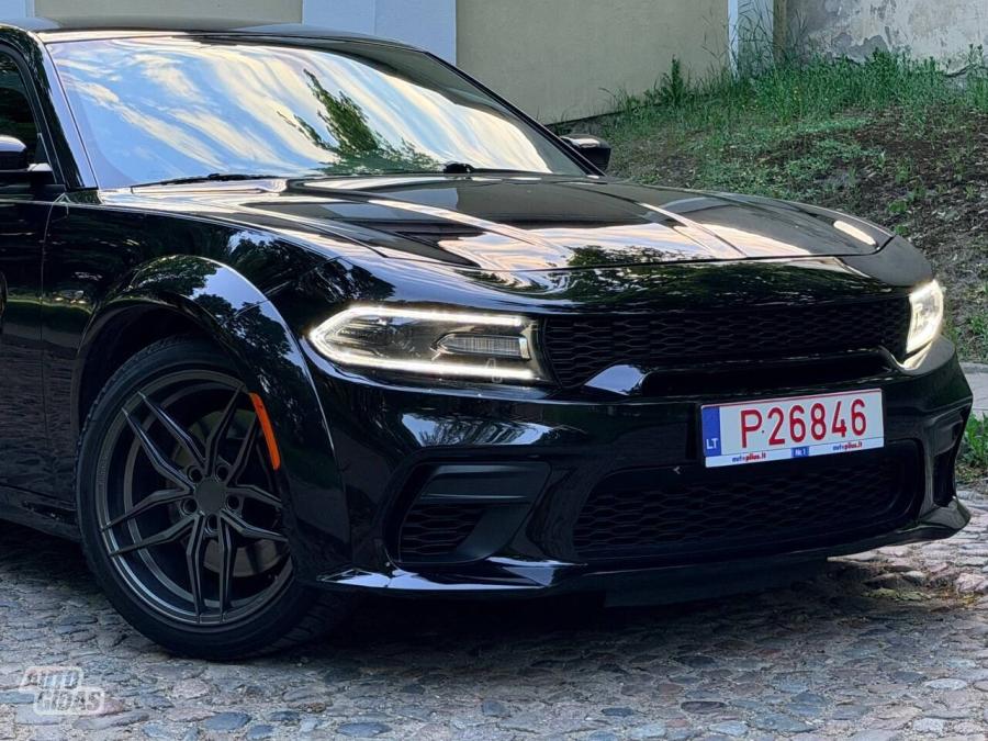 Black Dodge Charger 2016 in Vilnius, with an engine capacity of 5.70 L and mileage of 266 thousand km for 12500 €, photo 8 on AUTOMOTO.COM.LV