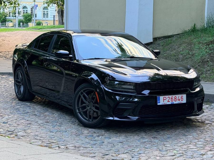 Black Dodge Charger 2016 in Vilnius, with an engine capacity of 5.70 L and mileage of 266 thousand km for 12500 €, photo 9 on AUTOMOTO.COM.LV