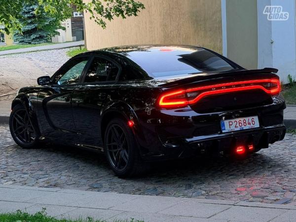 Black Dodge Charger 2016 in Vilnius, with an engine capacity of 5.70 L and mileage of 266 thousand km for 12500 €, photo 9 on AUTOMOTO.COM.LV