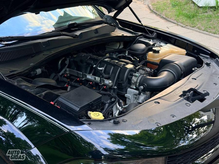 Black Dodge Charger 2016 in Vilnius, with an engine capacity of 5.70 L and mileage of 266 thousand km for 12500 €, photo 16 on AUTOMOTO.COM.LV