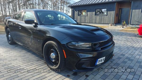 Black Dodge Charger 2018 in Tallinn, with an engine capacity of 5.70 L and mileage of 130 thousand km for 33900 €, photo 1 on AUTOMOTO.COM.LV