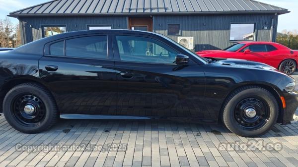 Black Dodge Charger 2018 in Tallinn, with an engine capacity of 5.70 L and mileage of 130 thousand km for 33900 €, photo 3 on AUTOMOTO.COM.LV