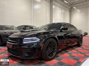 Melns Dodge Charger 2021 Viļņa, ar dzinēja tilpumu 6.42 L un nobraukumu 74 tūkst. km par 35999 €, foto  vietnē AUTOMOTO.COM.LV