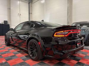 Black Dodge Charger 2021 in Vilnius, with an engine capacity of 6.42 L and mileage of 74 thousand km for 34999 €, photo 7 on AUTOMOTO.COM.LV