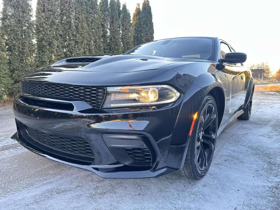 Black Dodge Charger 2022 in Siauliai, with an engine capacity of 5.65 L and mileage of 75 thousand km for 31000 €, photo 1 on AUTOMOTO.COM.LV