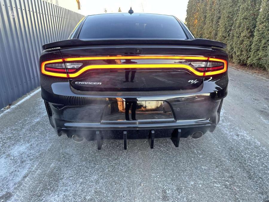 Black Dodge Charger 2022 in Siauliai, with an engine capacity of 5.65 L and mileage of 75 thousand km for 31000 €, photo 4 on AUTOMOTO.COM.LV