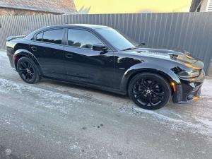 Black Dodge Charger 2022 in Siauliai, with an engine capacity of 5.65 L and mileage of 75 thousand km for 31000 €, photo 7 on AUTOMOTO.COM.LV