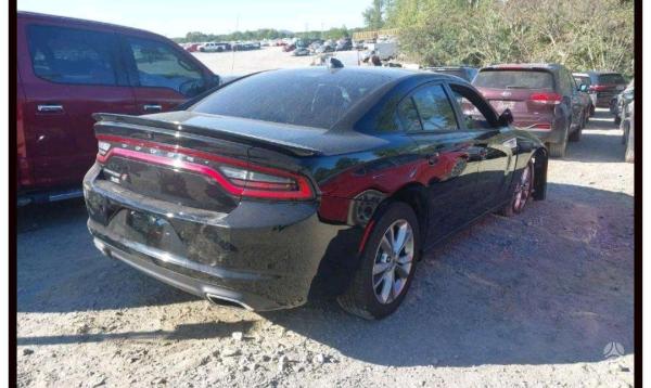 Black Dodge Charger 2022 in Kaunas, with an engine capacity of 3.60 L and mileage of 57 thousand km for 10648 €, photo 4 on AUTOMOTO.COM.LV