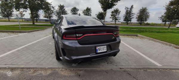 Dodge Charger 2021 in Panevezys on AUTOMOTO.COM.LV Grey Dodge Charger 2021 in Panevezys, with an engine capacity of 6.42 L and mileage of 78 thousand km for 28900 €, photo 4 on AUTOMOTO.COM.LV
