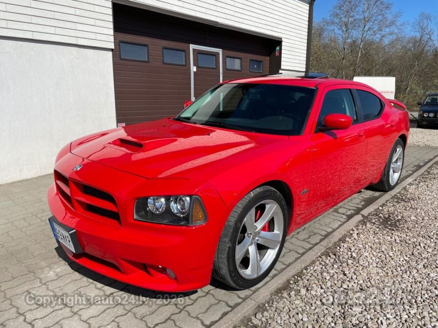 Sarkans Dodge Charger 2011 Veru, ar dzinēja tilpumu 6.10 L un nobraukumu 72 tūkst. km par 23900 €, foto 1 vietnē AUTOMOTO.COM.LV