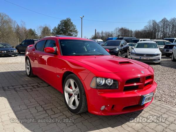 Sarkans Dodge Charger 2011 Veru, ar dzinēja tilpumu 6.10 L un nobraukumu 72 tūkst. km par 23900 €, foto 2 vietnē AUTOMOTO.COM.LV