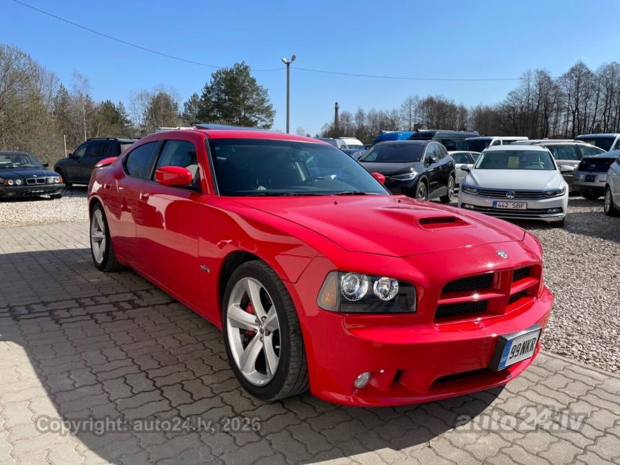 Sarkans Dodge Charger 2011 Veru, ar dzinēja tilpumu 6.10 L un nobraukumu 72 tūkst. km par 23900 €, foto 3 vietnē AUTOMOTO.COM.LV
