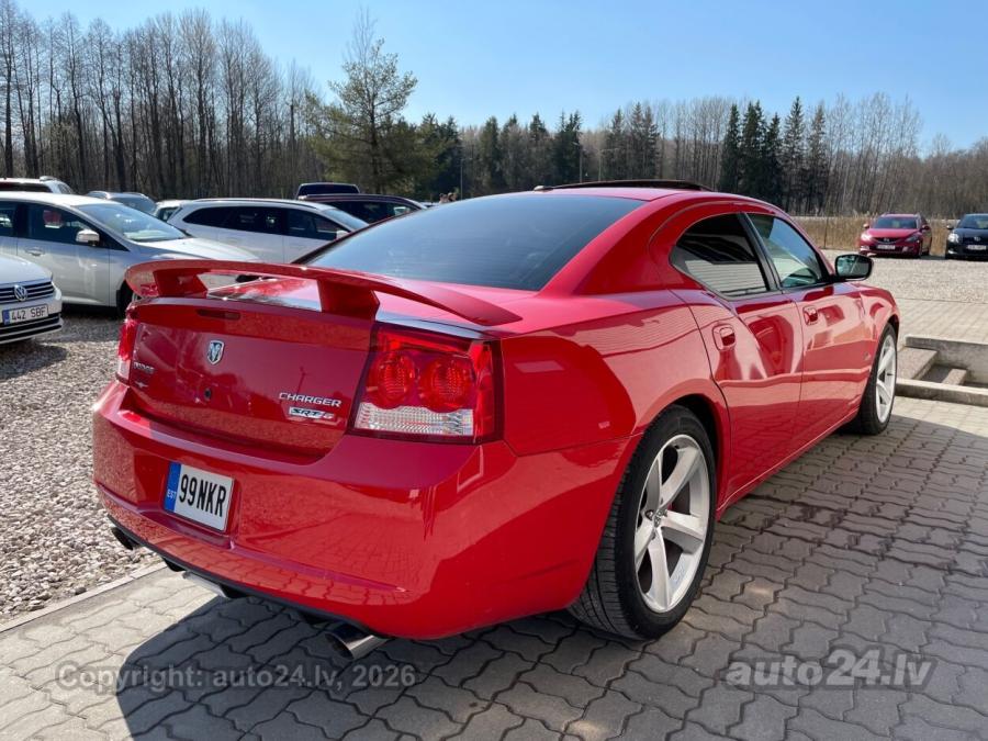 Sarkans Dodge Charger 2011 Veru, ar dzinēja tilpumu 6.10 L un nobraukumu 72 tūkst. km par 23900 €, foto 4 vietnē AUTOMOTO.COM.LV