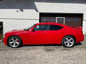 Sarkans Dodge Charger 2011 Veru, ar dzinēja tilpumu 6.10 L un nobraukumu 72 tūkst. km par 23900 €, foto 5 vietnē AUTOMOTO.COM.LV