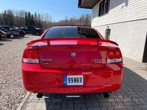 Sarkans Dodge Charger 2011 Veru, ar dzinēja tilpumu 6.10 L un nobraukumu 72 tūkst. km par 23900 €, foto 6 vietnē AUTOMOTO.COM.LV