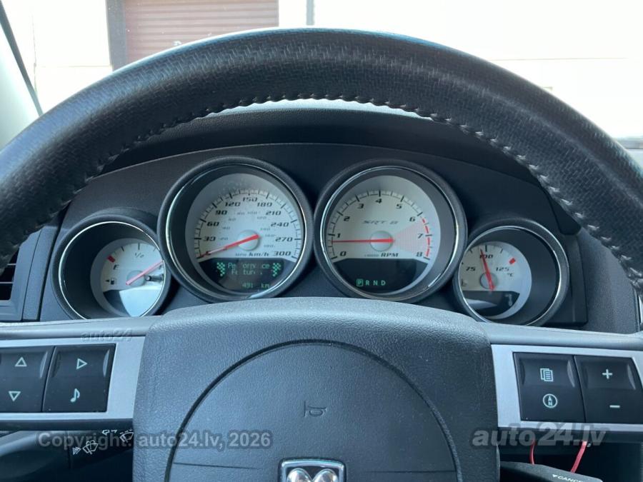 Sarkans Dodge Charger 2011 Veru, ar dzinēja tilpumu 6.10 L un nobraukumu 72 tūkst. km par 23900 €, foto 12 vietnē AUTOMOTO.COM.LV