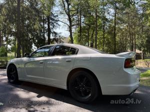 White Dodge Charger 2015 in Tallinn, with an engine capacity of 5.70 L and mileage of 0 thousand km for 15900 €, photo 12 on AUTOMOTO.COM.LV