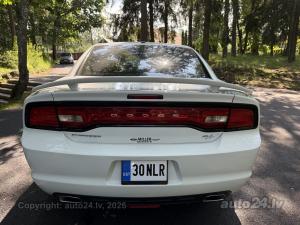 White Dodge Charger 2015 in Tallinn, with an engine capacity of 5.70 L and mileage of 0 thousand km for 15900 €, photo 14 on AUTOMOTO.COM.LV