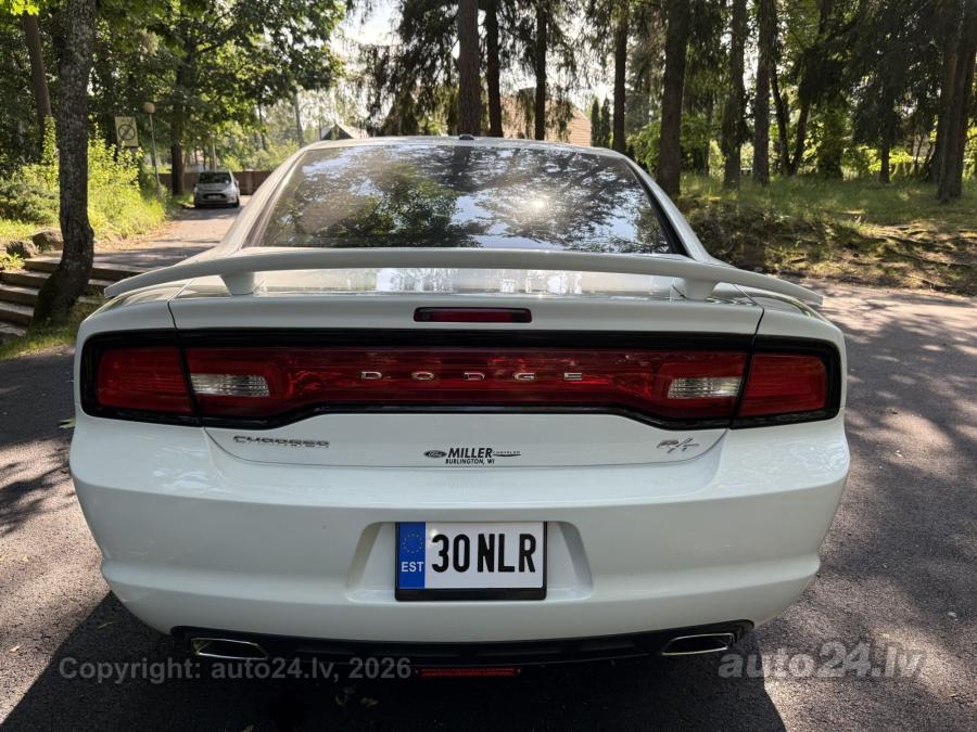 White Dodge Charger 2015 in Tallinn, with an engine capacity of 5.70 L and mileage of 0 thousand km for 15900 €, photo 14 on AUTOMOTO.COM.LV