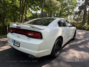 White Dodge Charger 2015 in Tallinn, with an engine capacity of 5.70 L and mileage of 0 thousand km for 15900 €, photo 16 on AUTOMOTO.COM.LV