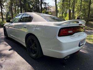 White Dodge Charger 2015 in Tallinn, with an engine capacity of 5.65 L and mileage of 196 thousand km for 11999 €, photo 12 on AUTOMOTO.COM.LV
