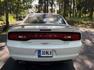 White Dodge Charger 2015 in Tallinn, with an engine capacity of 5.65 L and mileage of 196 thousand km for 11999 €, photo 13 on AUTOMOTO.COM.LV