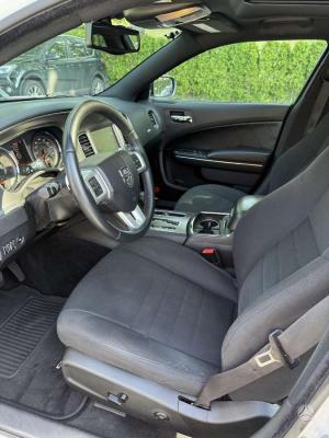 White Dodge Charger 2015 in Tallinn, with an engine capacity of 5.65 L and mileage of 196 thousand km for 11999 €, photo 18 on AUTOMOTO.COM.LV