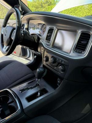 White Dodge Charger 2015 in Tallinn, with an engine capacity of 5.65 L and mileage of 196 thousand km for 11999 €, photo 24 on AUTOMOTO.COM.LV