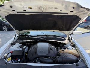 White Dodge Charger 2015 in Tallinn, with an engine capacity of 5.65 L and mileage of 196 thousand km for 11999 €, photo 25 on AUTOMOTO.COM.LV