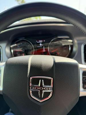 White Dodge Charger 2015 in Tallinn, with an engine capacity of 5.65 L and mileage of 196 thousand km for 11999 €, photo 27 on AUTOMOTO.COM.LV