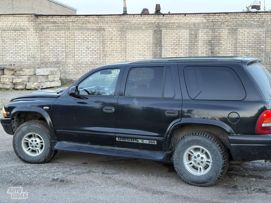 Black Dodge Durango 1999 in Radviliskis, with an engine capacity of 5.90 L and mileage of 280 thousand km for 1250 €, photo 5 on AUTOMOTO.COM.LV