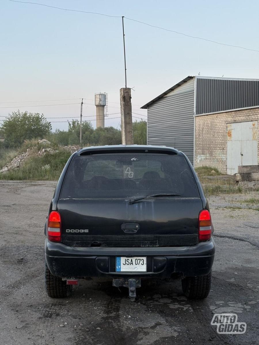 Black Dodge Durango 1999 in Radviliskis, with an engine capacity of 5.90 L and mileage of 280 thousand km for 1250 €, photo 6 on AUTOMOTO.COM.LV