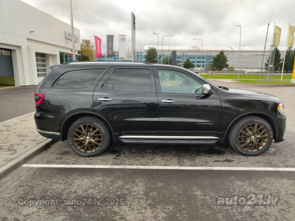 Black Dodge Durango 2013 in Tallinn, with an engine capacity of 3.60 L and mileage of 265 thousand km for 17500 €, photo 6 on AUTOMOTO.COM.LV